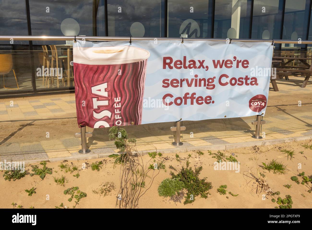 Large Costa banner cable tied to railings outside Marina Centre Great ...