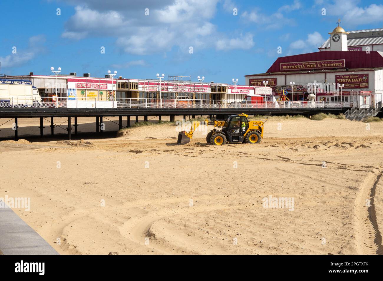Diggers on Great Yarmouth beach moving sand away from sea walls after ...