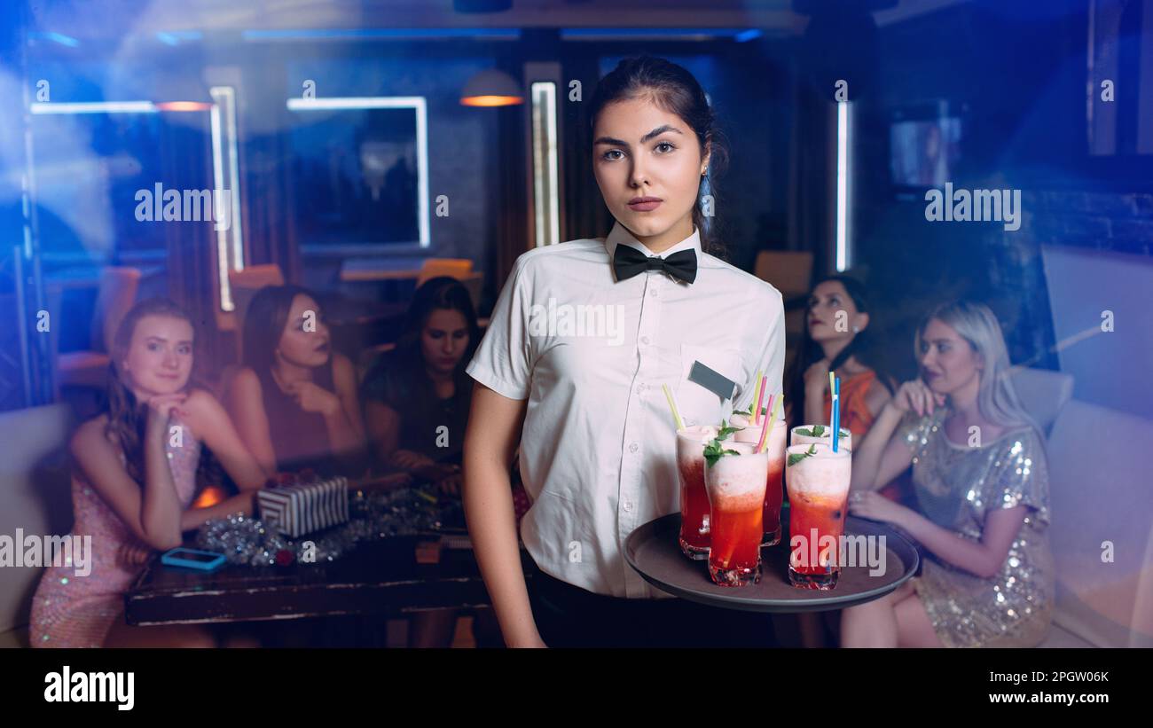 restaurant bar vip service waitress customer drink Stock Photo - Alamy