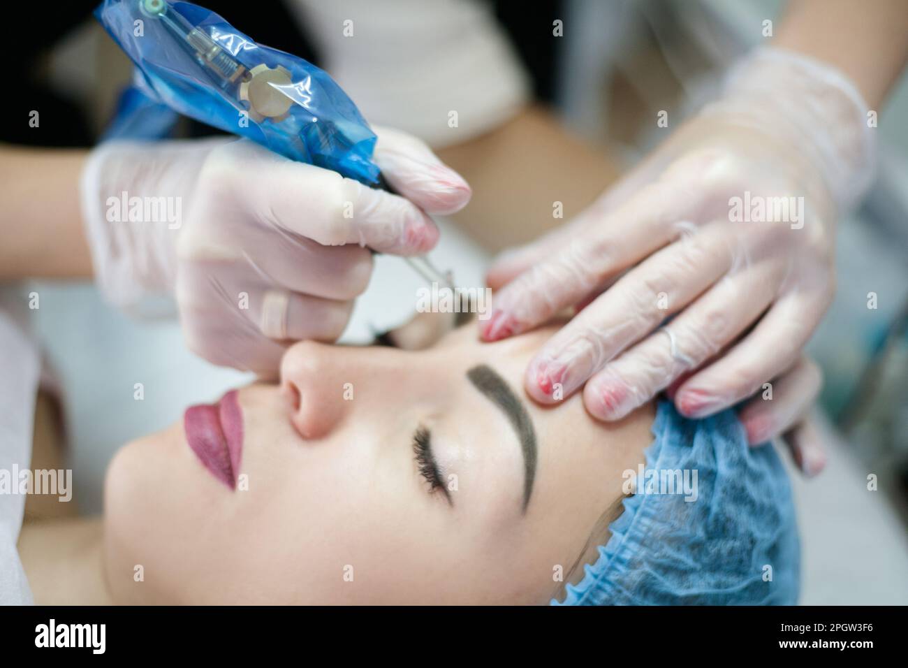eyebrow microblading lady face beauty procedure Stock Photo - Alamy