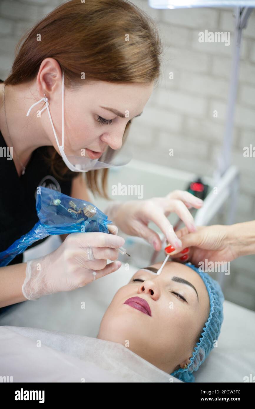 decorative cosmetology tattoo eyebrow microblading Stock Photo - Alamy