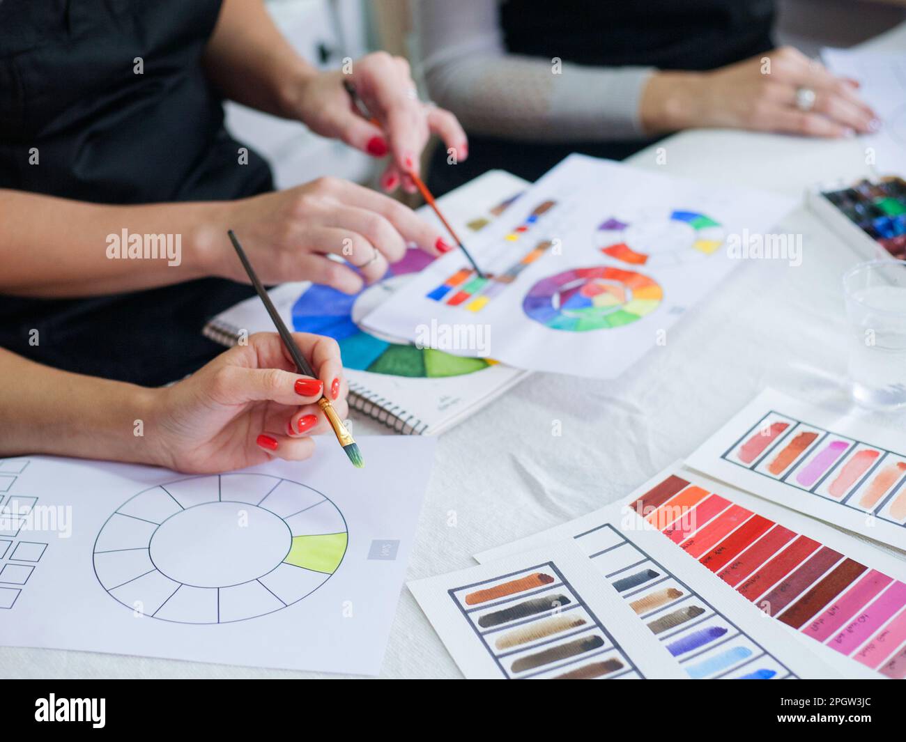 Artist mixing colors for makeup hi-res stock photography and images - Alamy