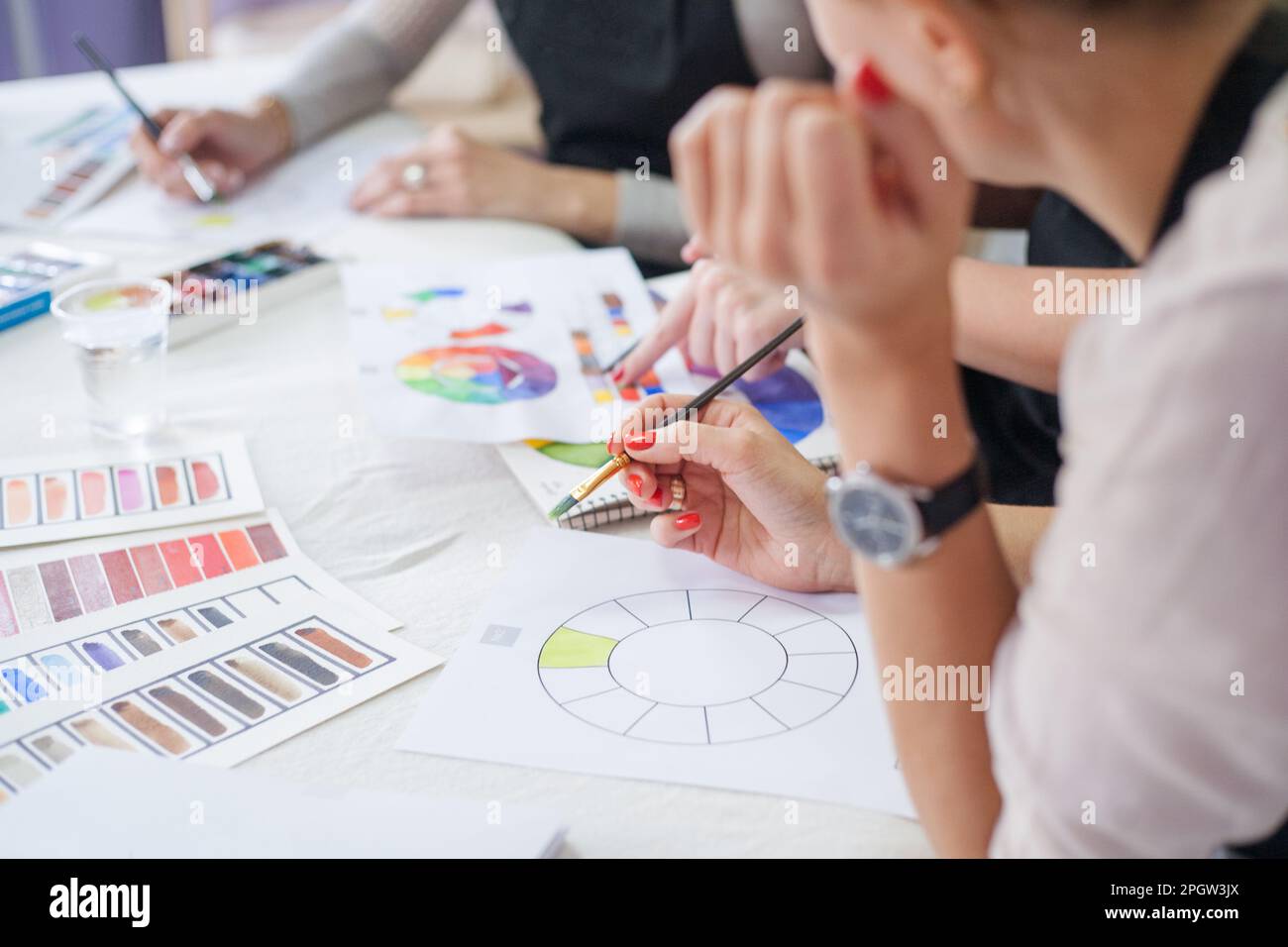 Artist mixing colors for makeup hi-res stock photography and images - Alamy