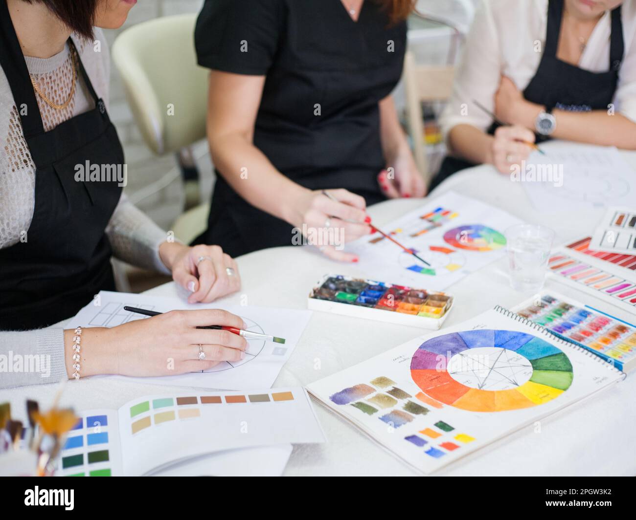 Artist mixing colors for makeup hi-res stock photography and images - Alamy