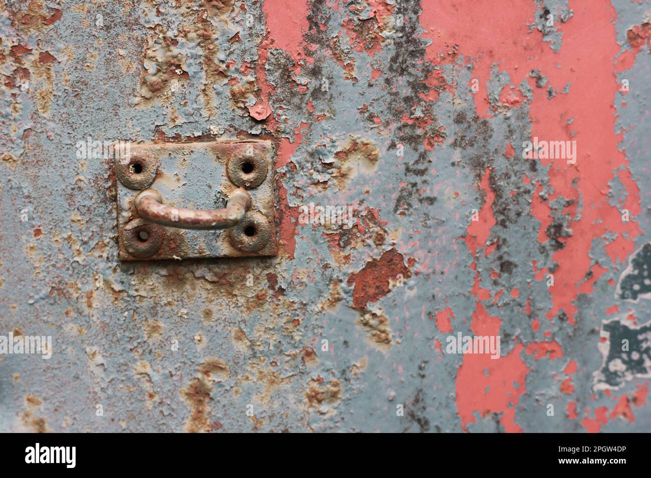 Old rusty metal wall with lots of aging and texture with a hook Stock ...