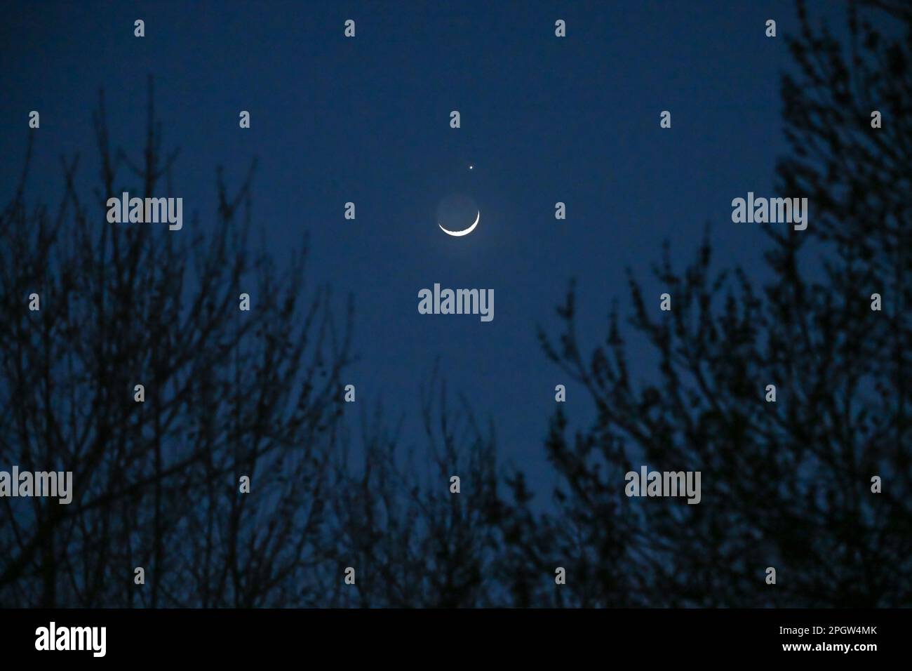 Beijing, China. 24th Mar, 2023. The planet Venus and the crescent moon ...