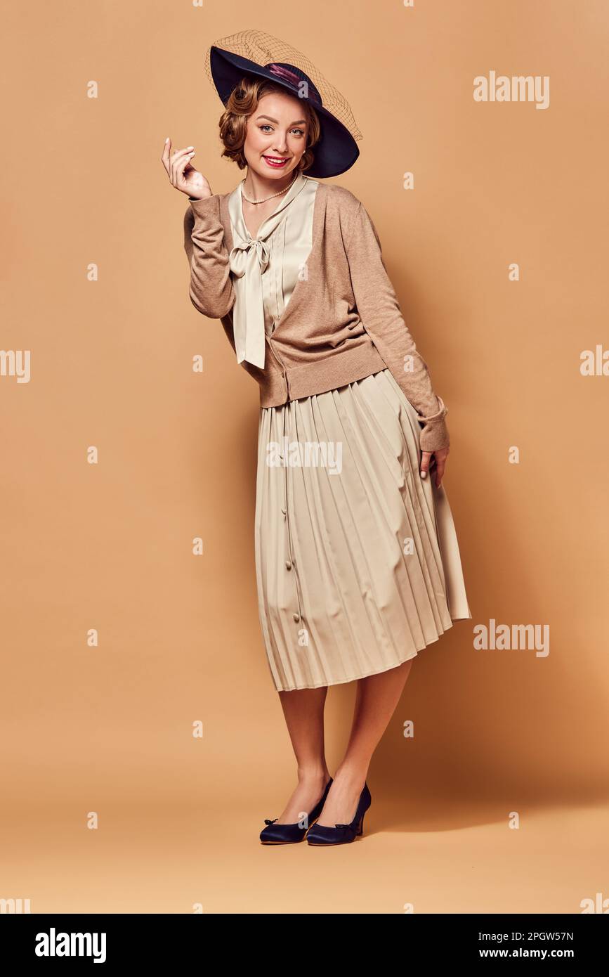 Shot of lady wearing vintage clothes looking with cunning facial ...