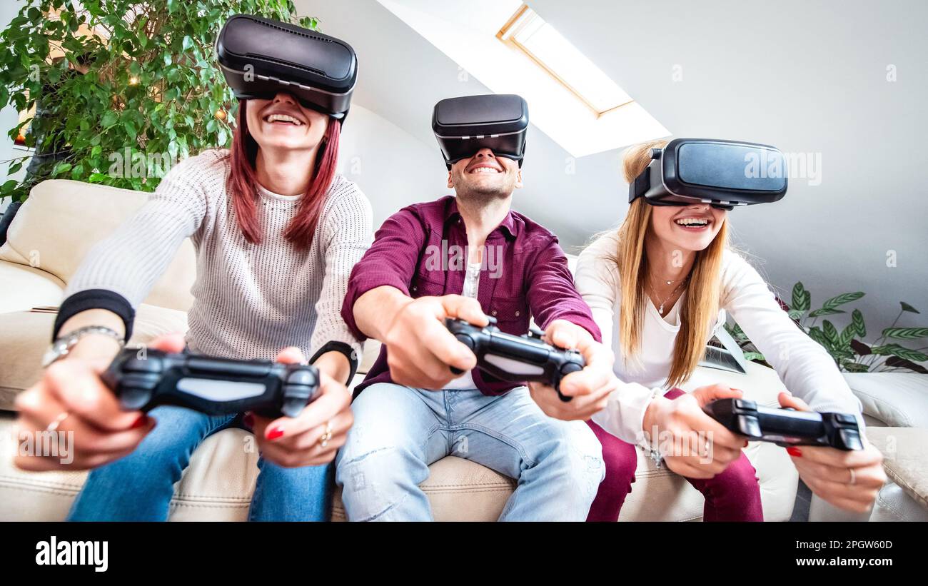 Trendy people playing with vr glasses at shared apartment - Virtual ...