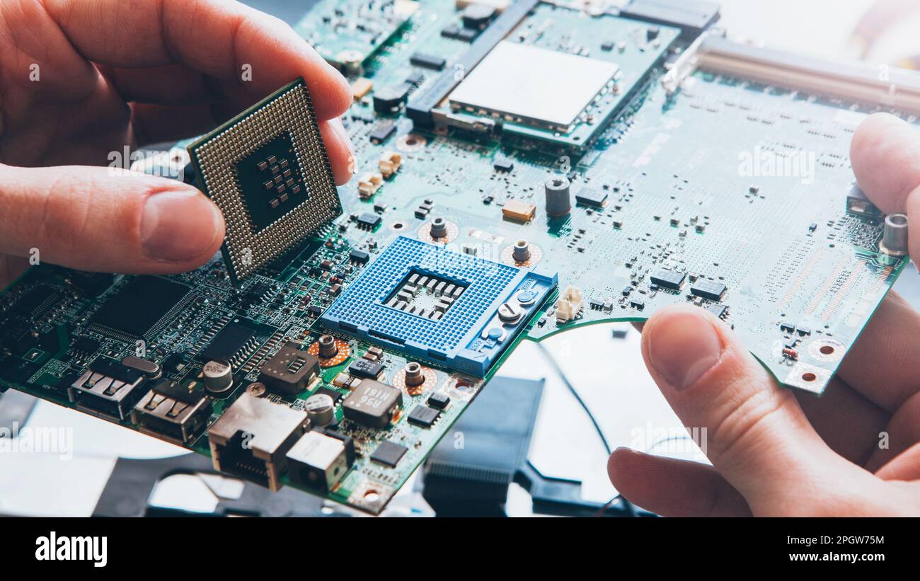tech support hardware repair cpu motherboard Stock Photo - Alamy