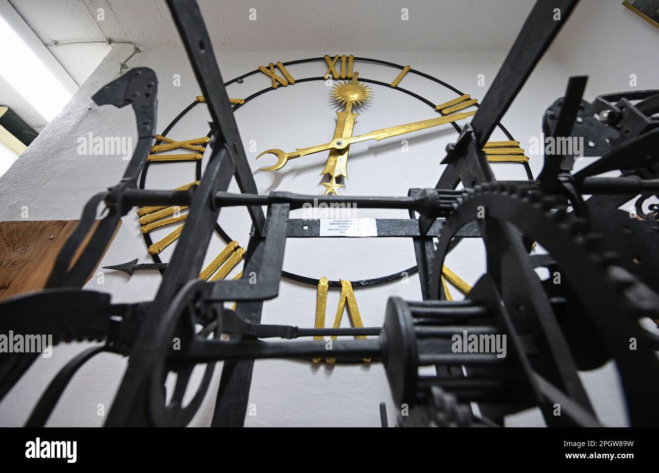 Stuttgart, Germany. 20th Mar, 2023. A restored historic tower clock is on display at the Tower ...