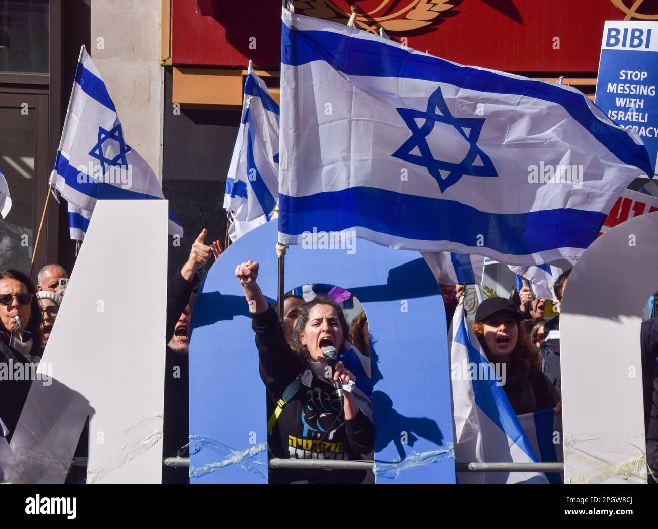 London, UK. 24th March 2023. Crowds of British Israelis staged a ...