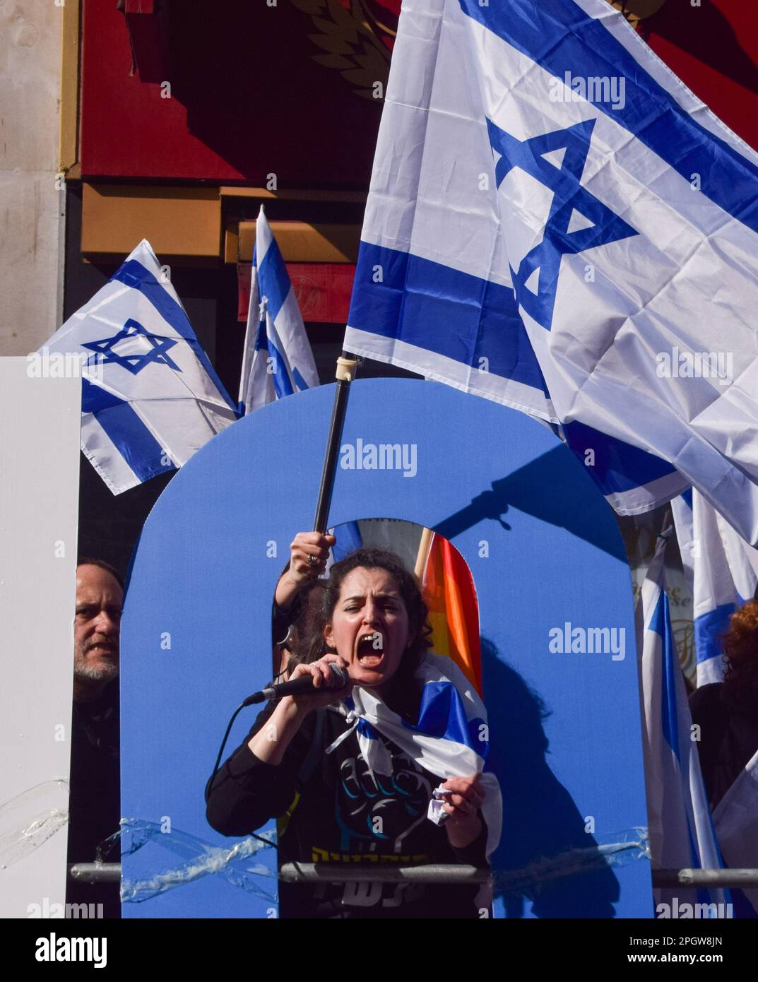 London, UK. 24th March 2023. Crowds of British Israelis staged a ...