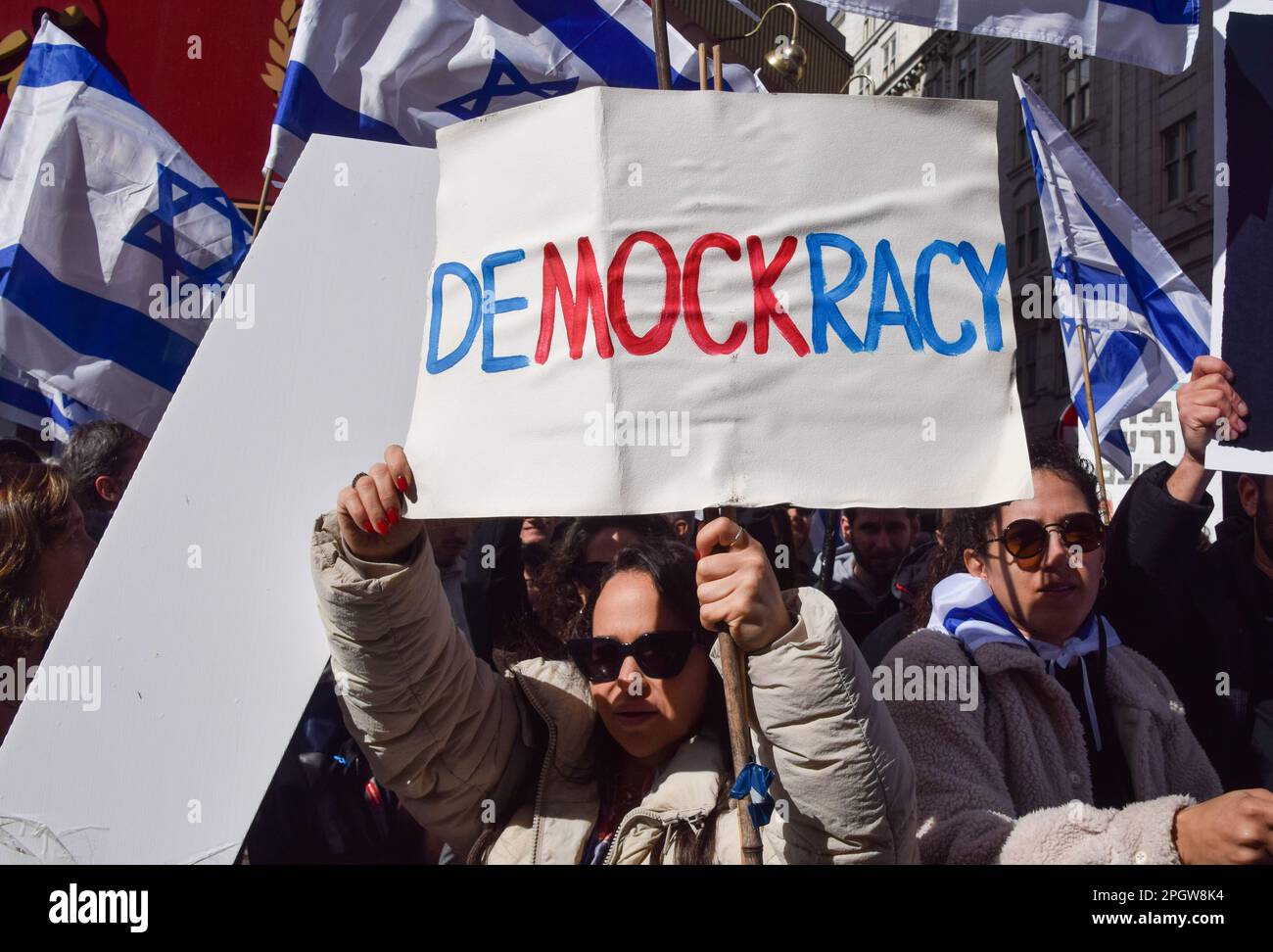 London, UK. 24th March 2023. Crowds of British Israelis staged a ...