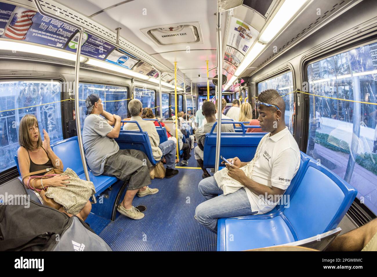 Miami, USA - August 18, 2014: people in the downtown Metro bus in Miami ...