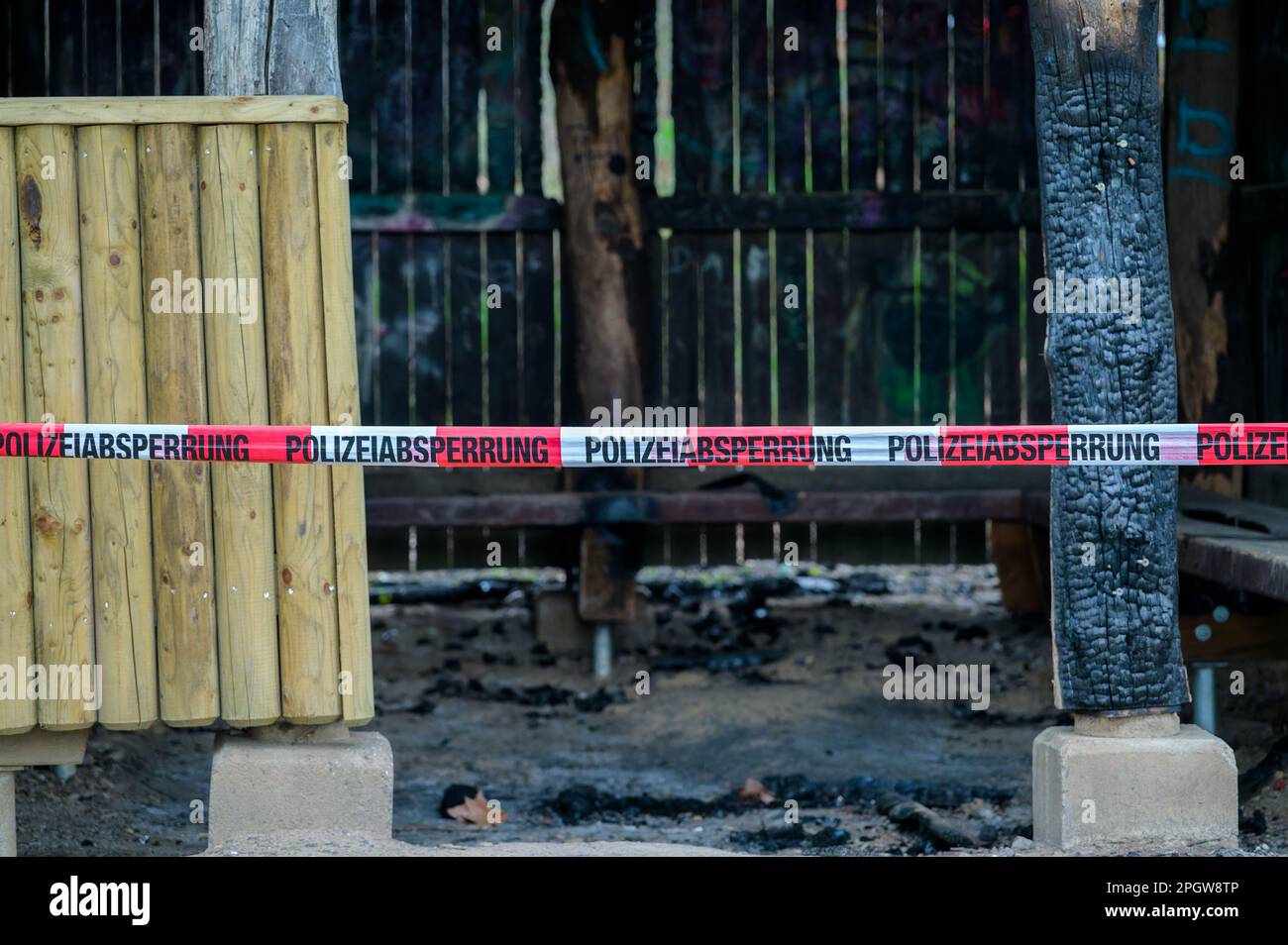 Arson crime scene with german police cordon or barrier tape in front of it Stock Photo - Alamy