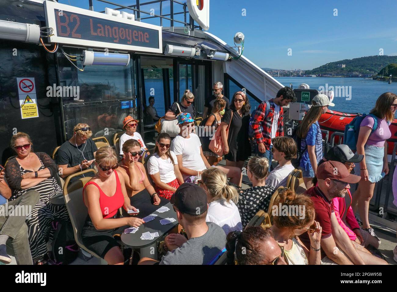Norway, Oslo, Passengers on a ferry cruising the Oslo fjord. Photo ...