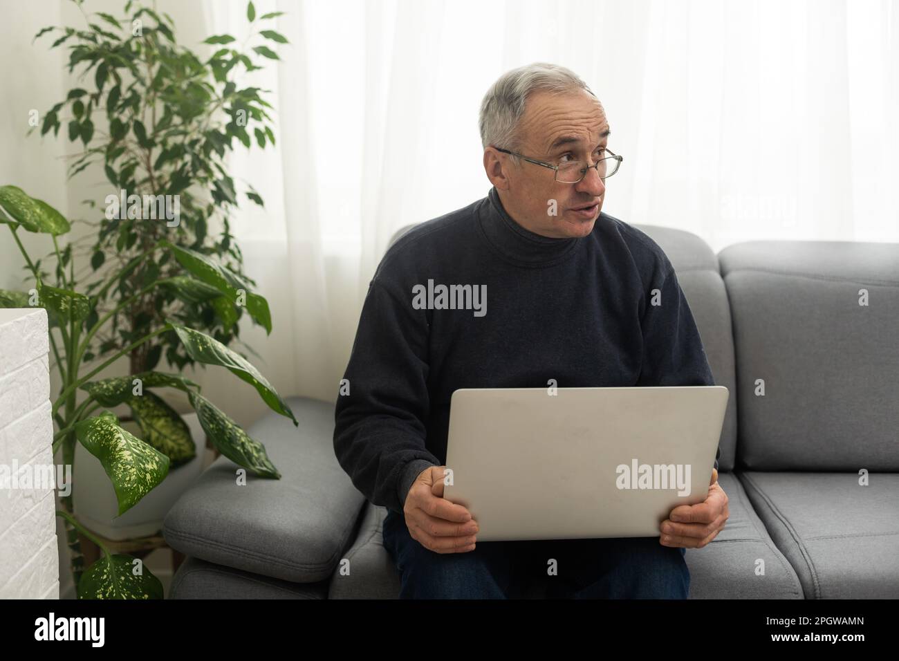 Busy smart mature professional man using laptop sitting. Middle aged ...