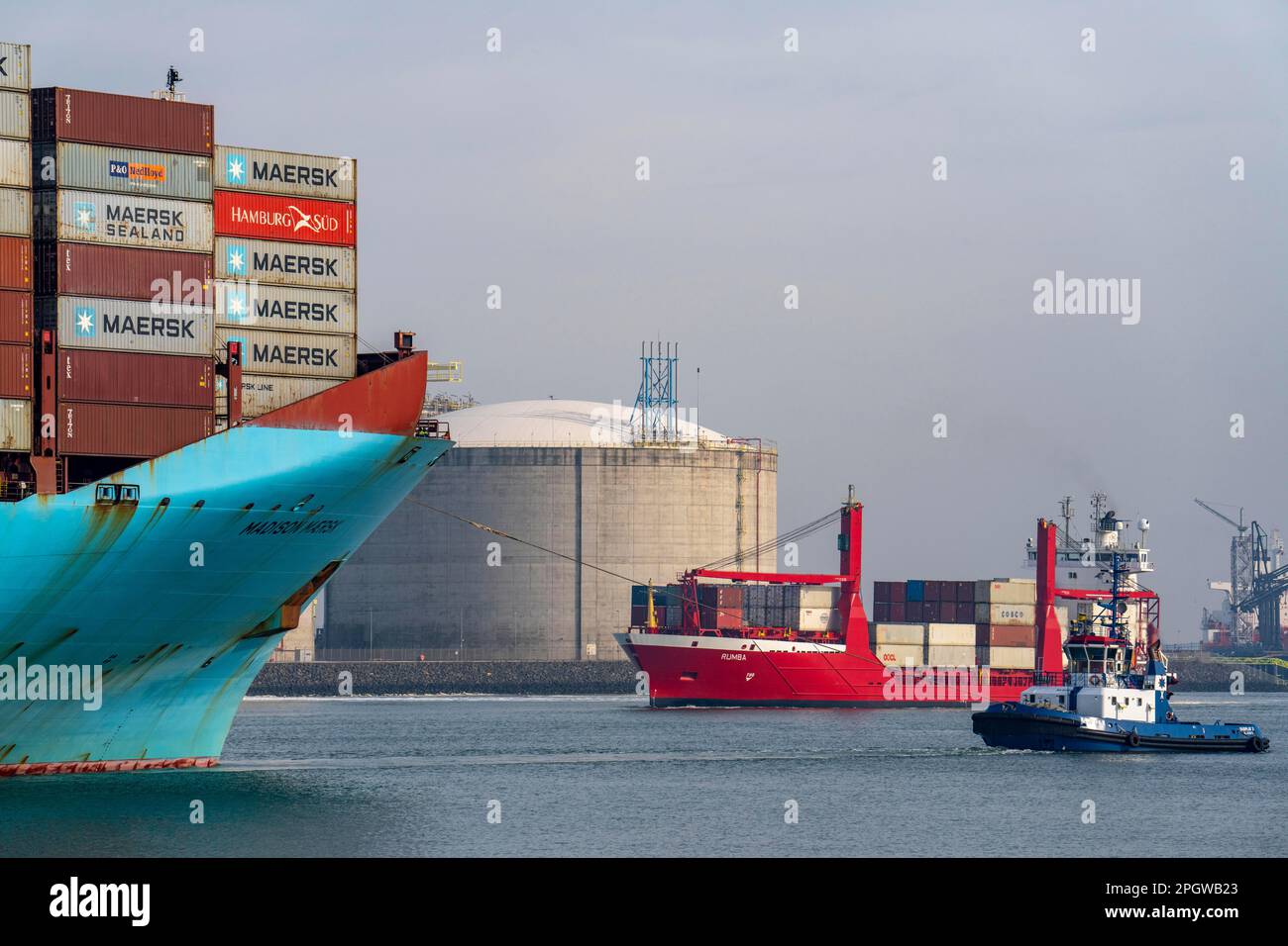 LNG import terminal tanks for liquid natural gas in the seaport of Rotterdam, harbour tug ...