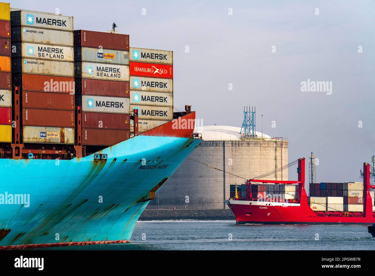 LNG import terminal Tanks for liquid natural gas in the seaport of Rotterdam, harbour tug brings ...