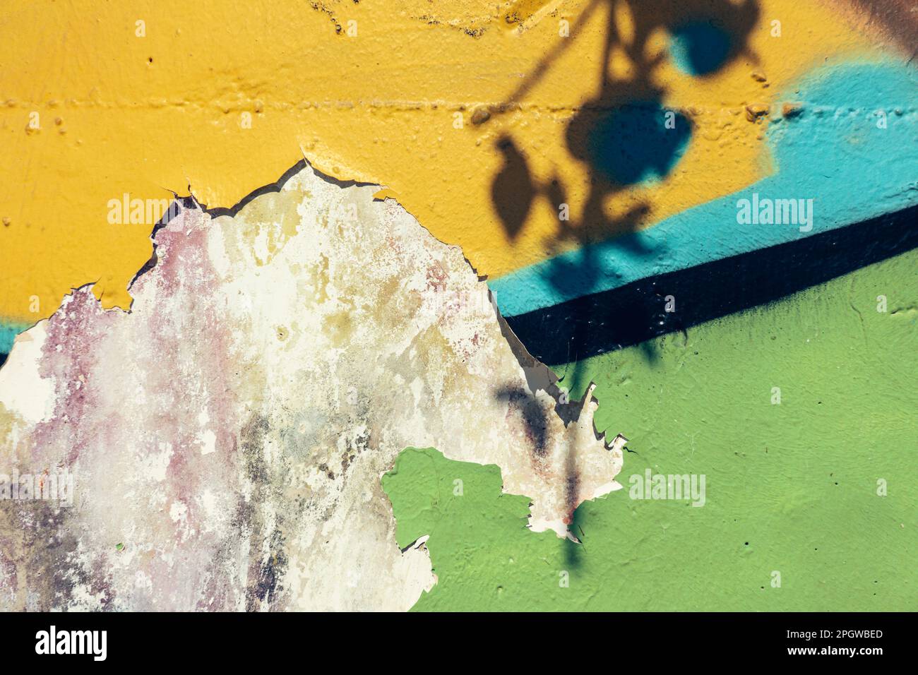 Old weathered colorful graffiti painted plaster wall surface background ...