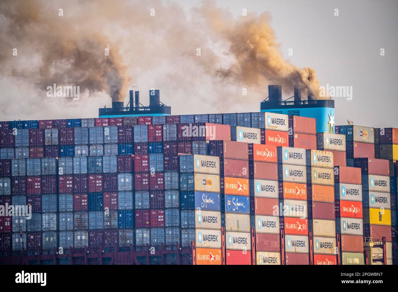 Container freighter Madison Maersk smoking ship's diesel stacks ...