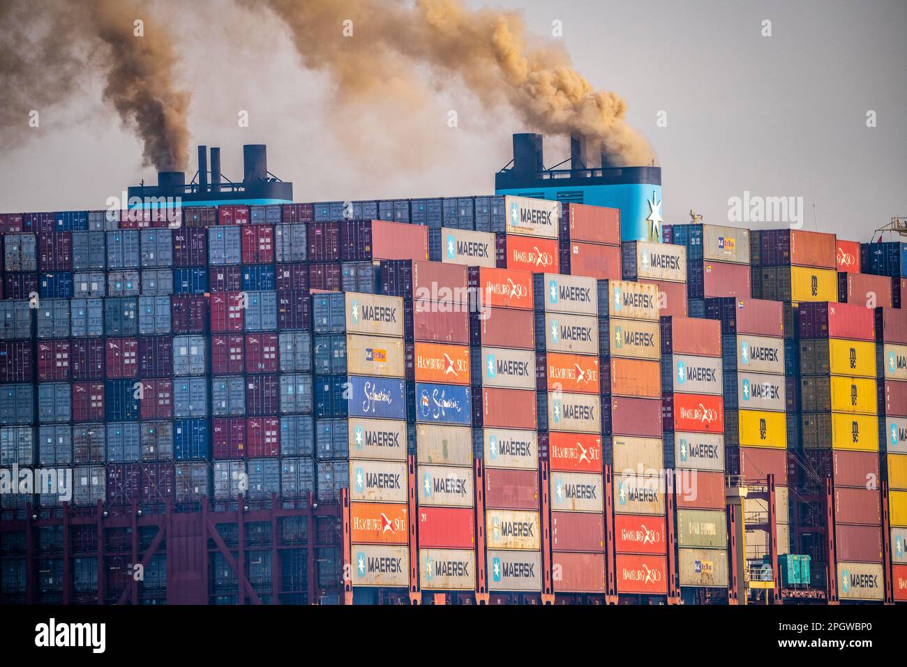 Container freighter Madison Maersk smoking ship's diesel stacks ...