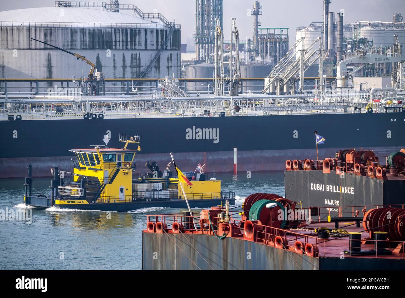 Cargo ships, tankers in the seaport of Rotterdam, in the Petroleumhaven ...
