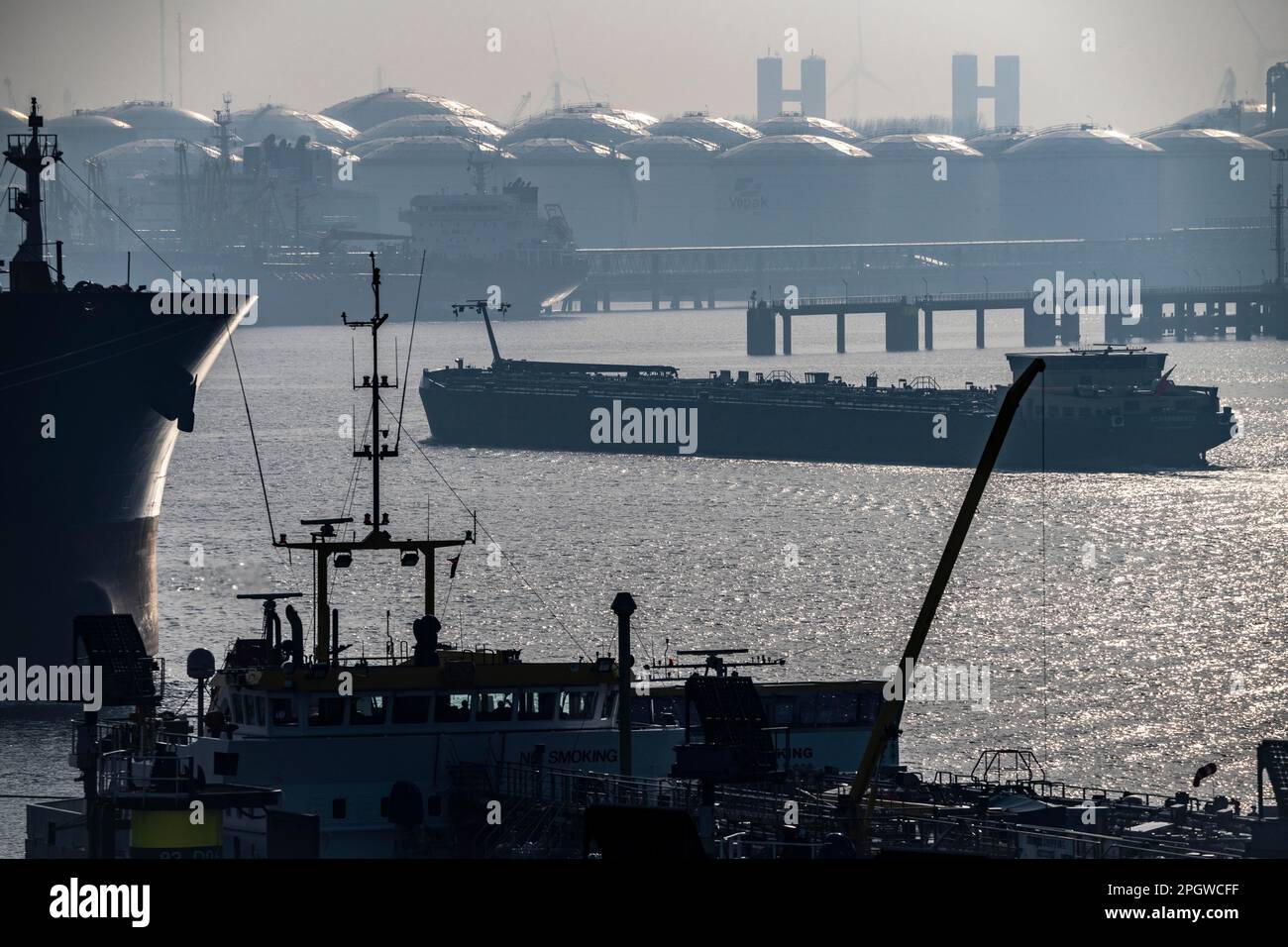 Cargo ships, tankers in the seaport of Rotterdam, in the Petroleumhaven ...