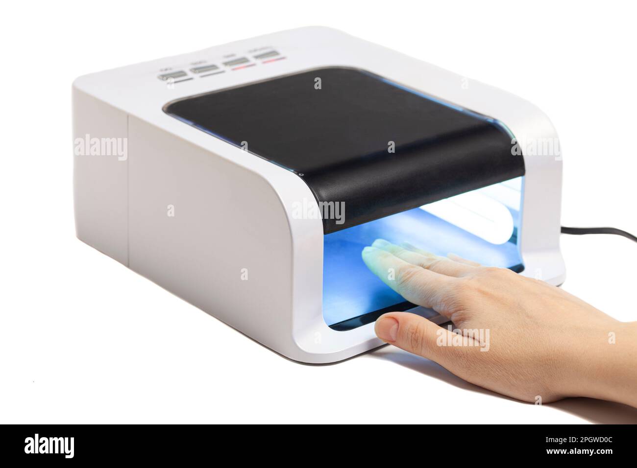 Woman Nail Polish process. Female using shellac uv led lamp Stock Photo ...