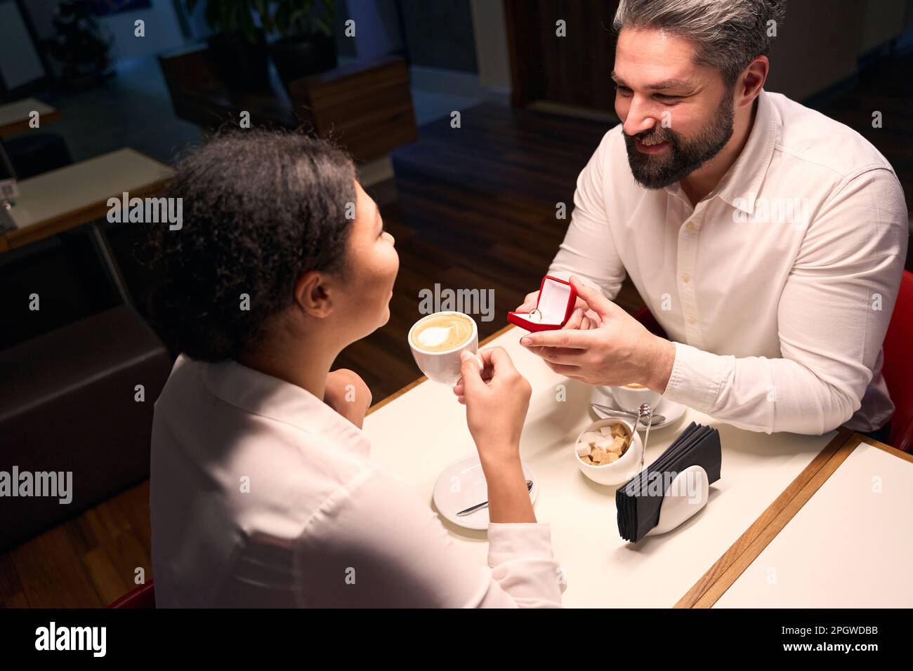 Man making proposal in coffee shop hi-res stock photography and images ...