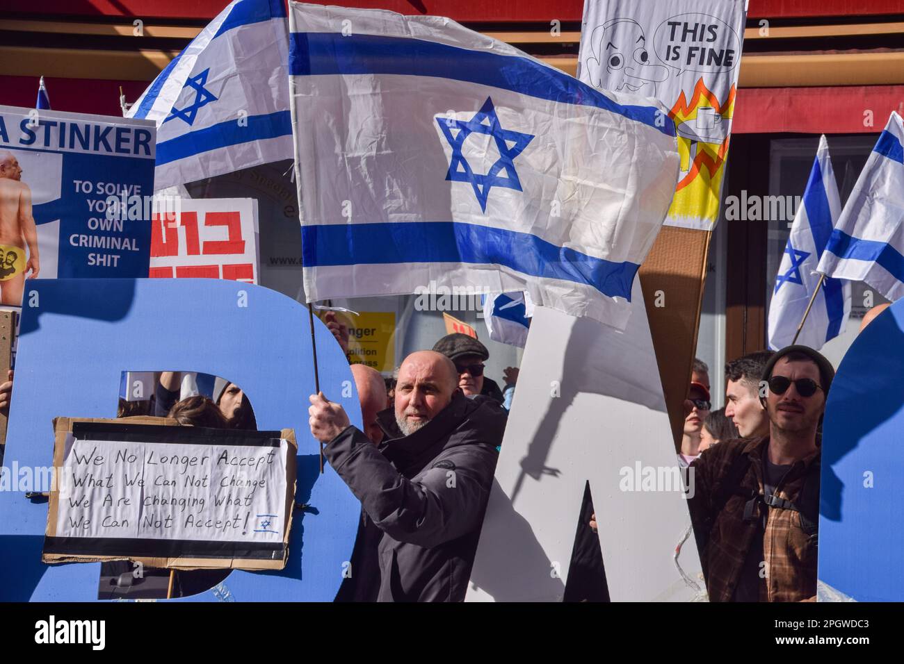London, UK. 24th March 2023. Crowds of British Israelis staged a ...