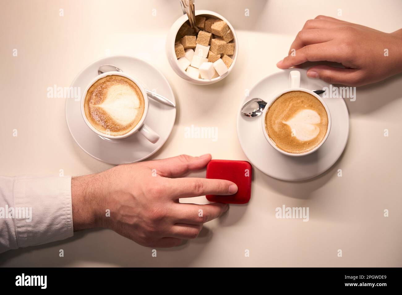 Man making proposal with coffee cup hi-res stock photography and images ...