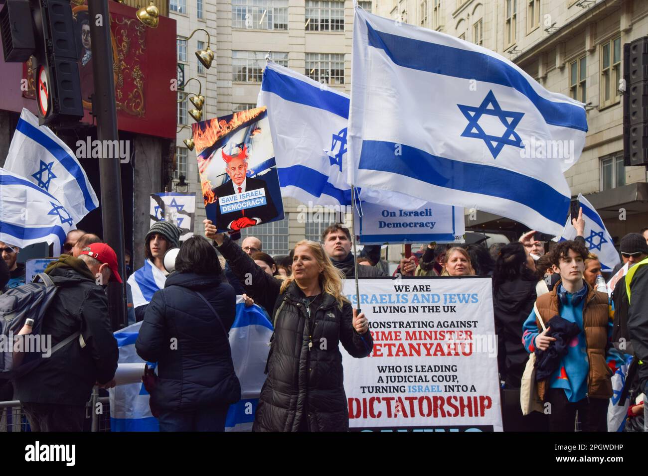 London, UK. 24th March 2023. Crowds of British Israelis staged a ...