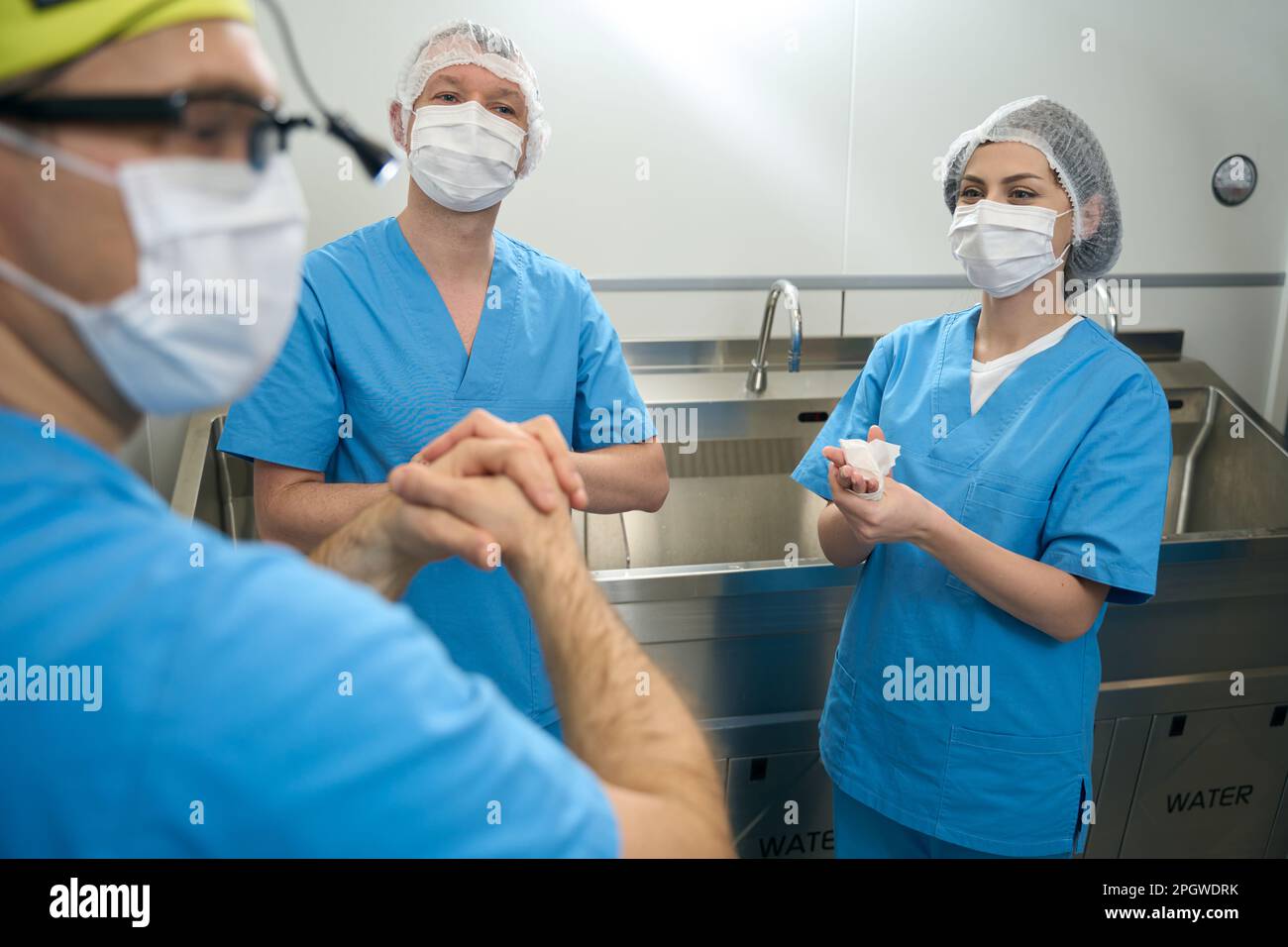 Preparation of medical staff for a surgical operation Stock Photo - Alamy