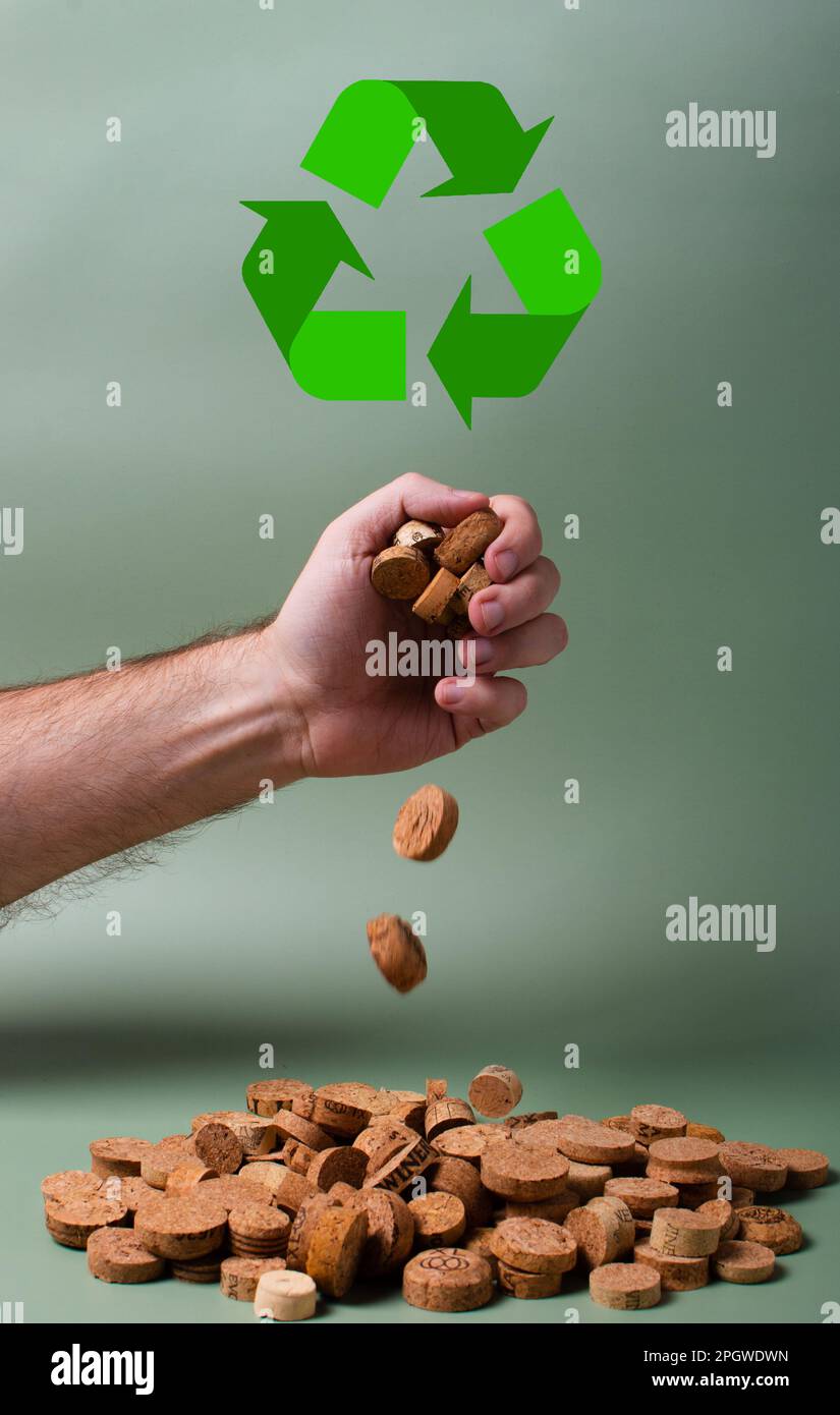 Recycling symbol and wine cork for secondary use. Preservation of the ...