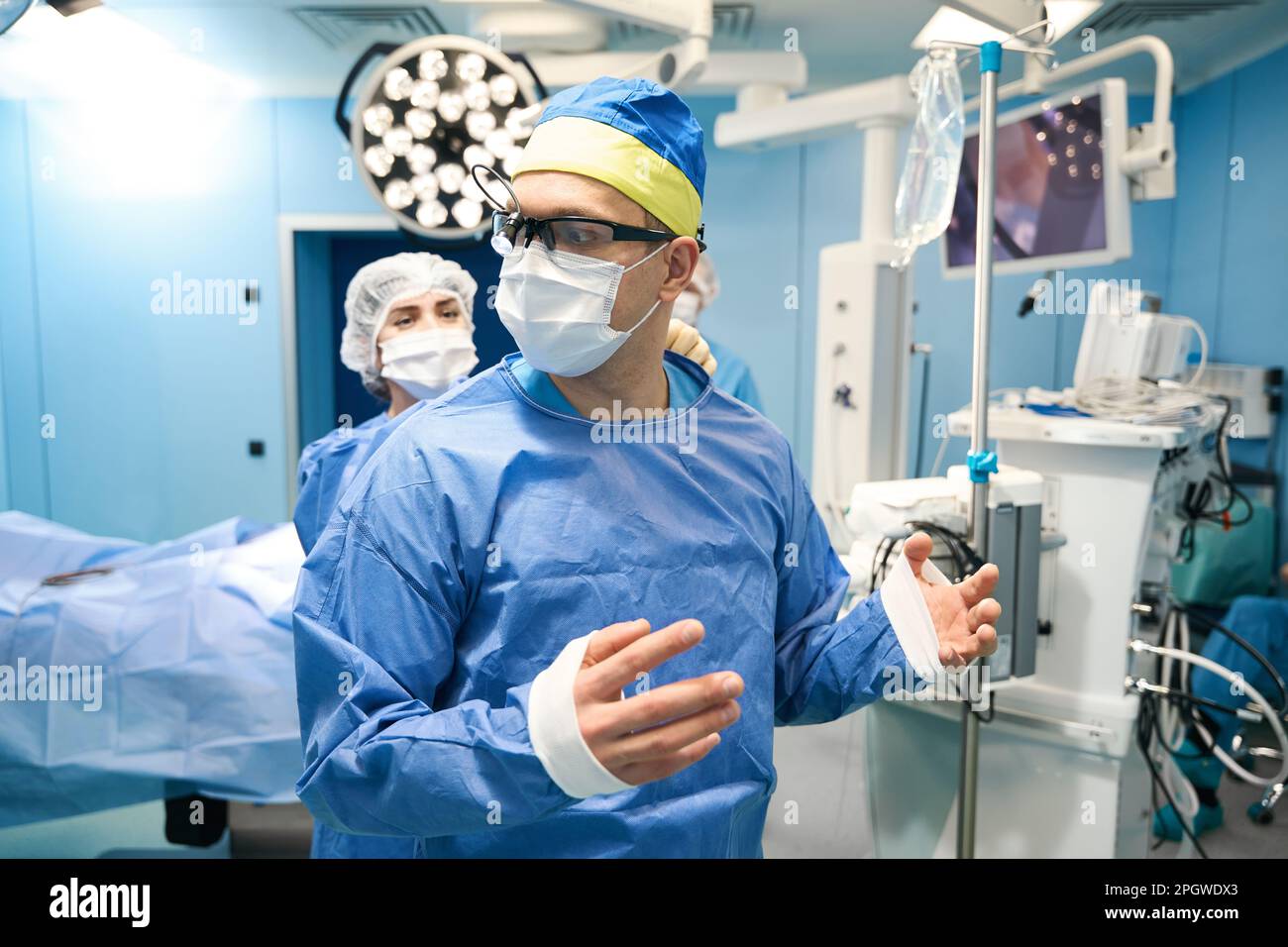 Process of preparing medical staff for a surgical operation Stock Photo ...