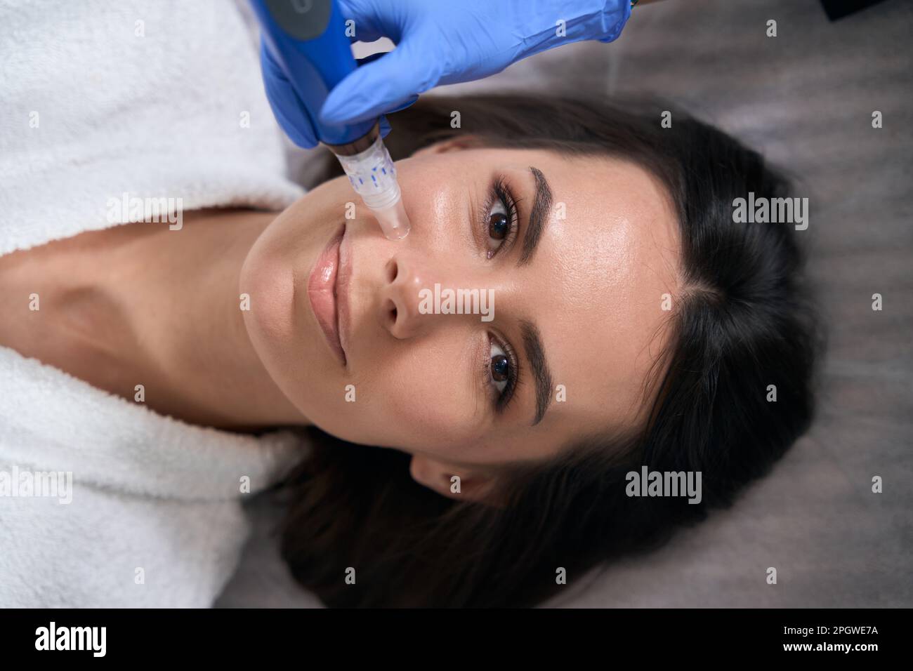 Close up photo of woman doing face resurfacing procedure Stock Photo ...