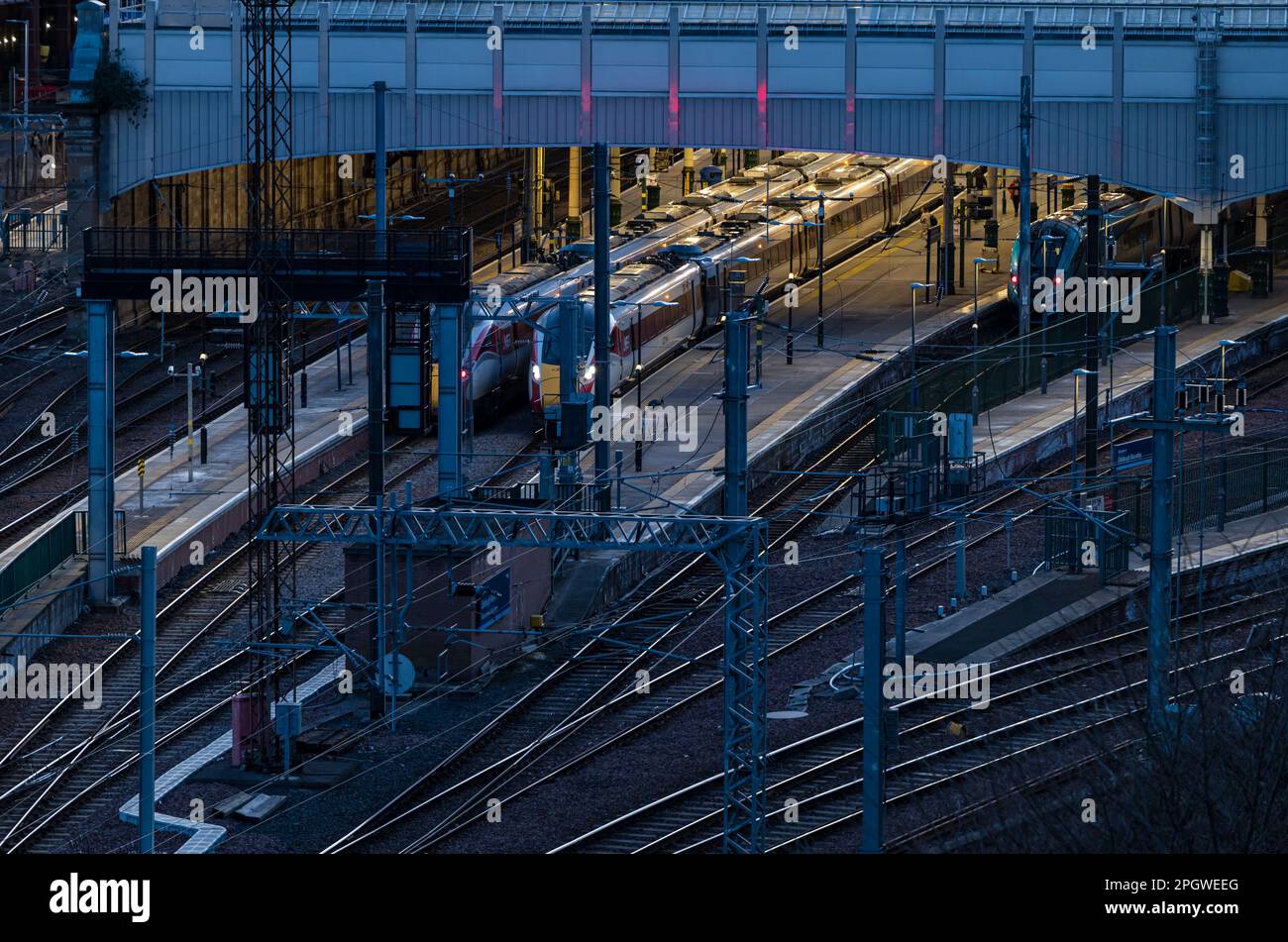 LNER trains at platform with view of rail tracks or lines, Waverley Railway Station, Edinburgh ...