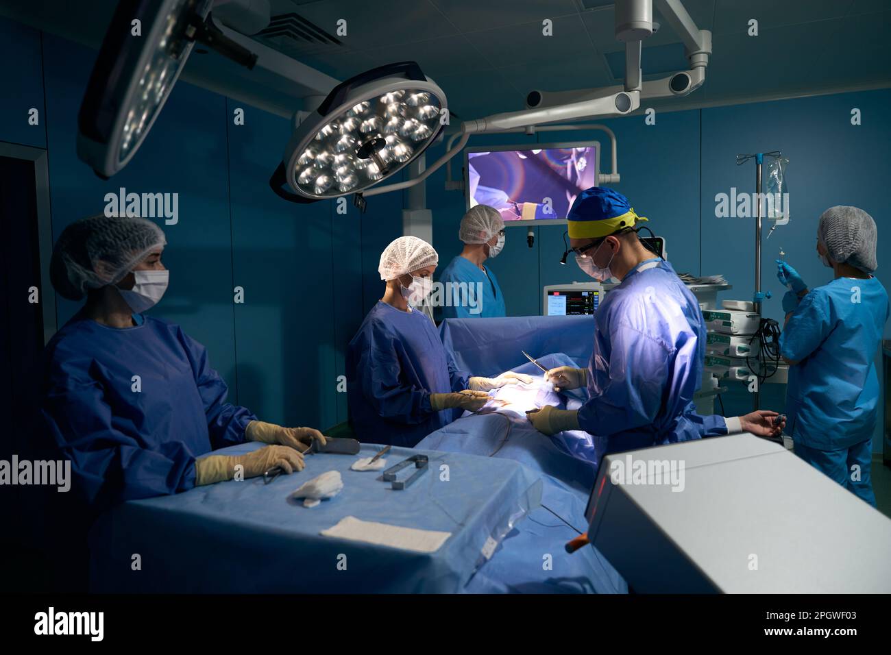 Surgeon operates on a patient in a modern operating room Stock Photo ...