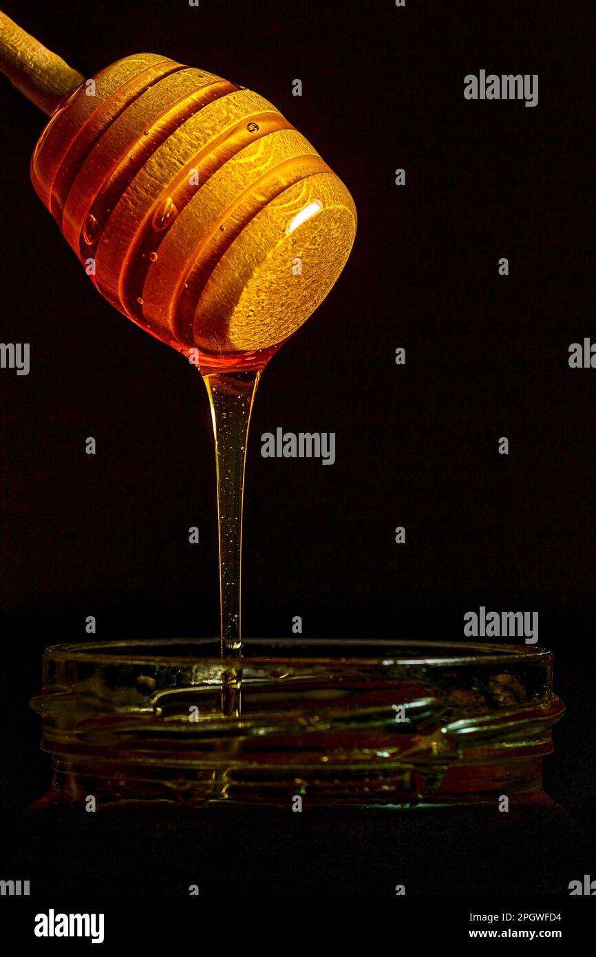 Pouring honey onto delicious hi-res stock photography and images - Alamy