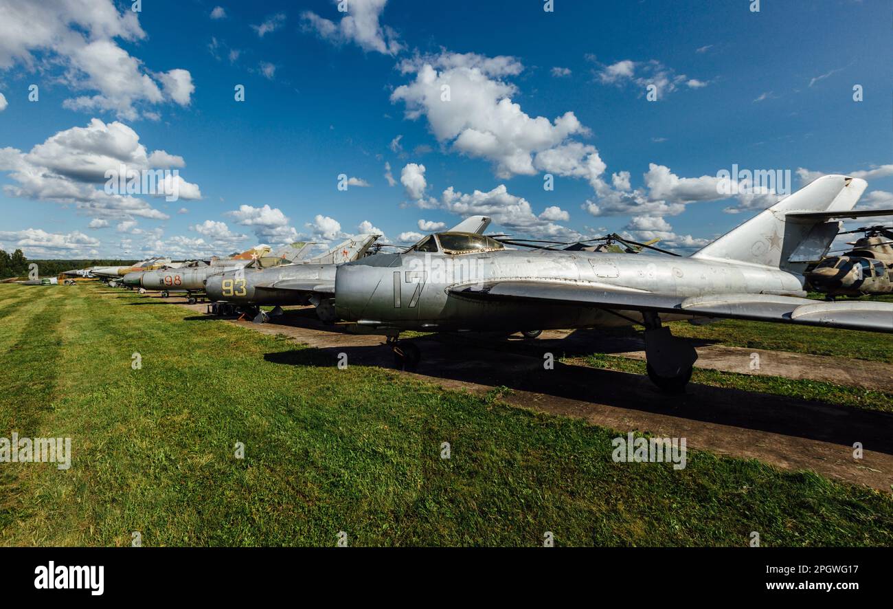 Old broken Soviet military fighter airplanes in abandoned airfield ...