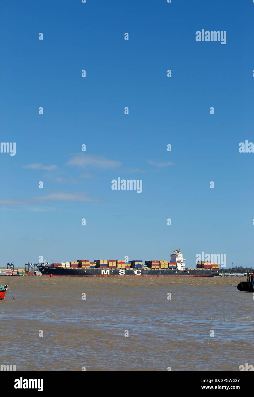Container ship MSC Nerissa docking at the Port of Felixstowe, Suffolk ...
