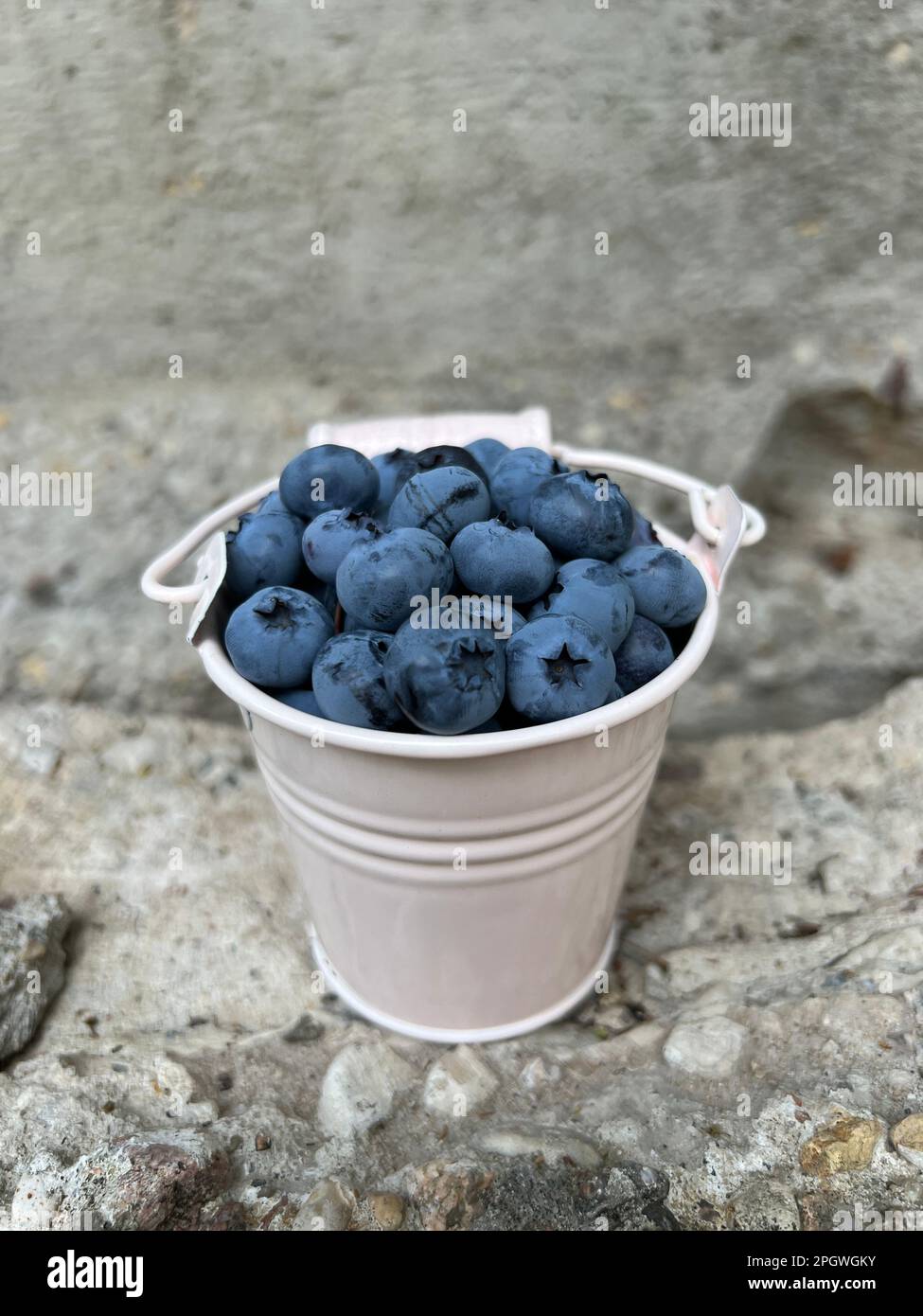 Blue bucket full fresh fruit hi-res stock photography and images - Alamy