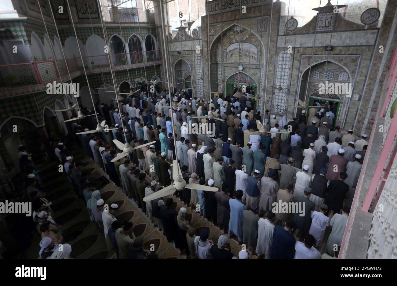Faithfull Muslims are performing first Friday Prayer during the Holy ...