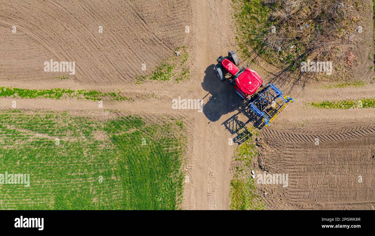 Above top view on tractor as pulling mounted seedbed cultivator ...