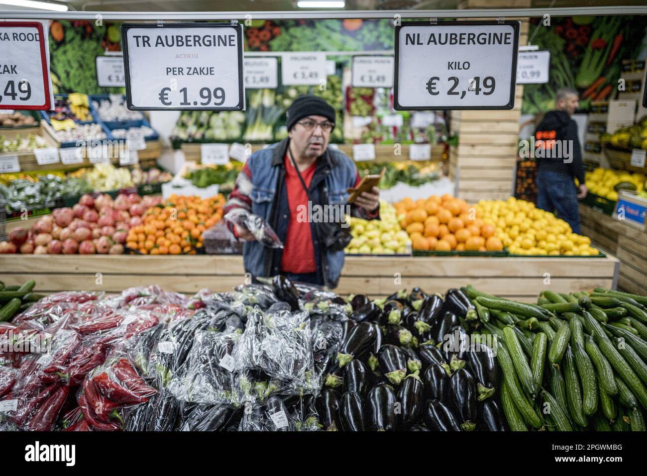HENGELO - Consumers do their shopping in Temiz Market in preparation ...