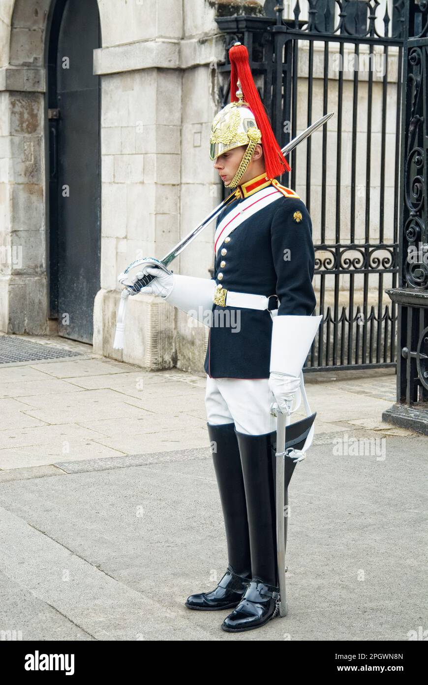 A guard stands on duty in front of the Horse Guards Parade, which is ...