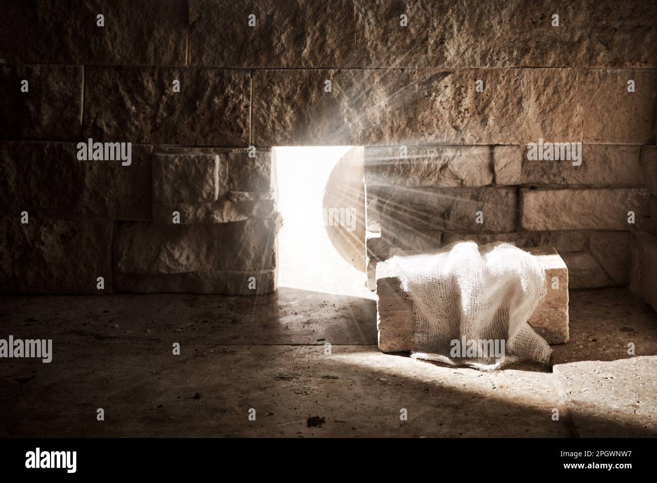 Empty tomb while light shines from the outside. Jesus Christ Resurrection. Christian Easter ...