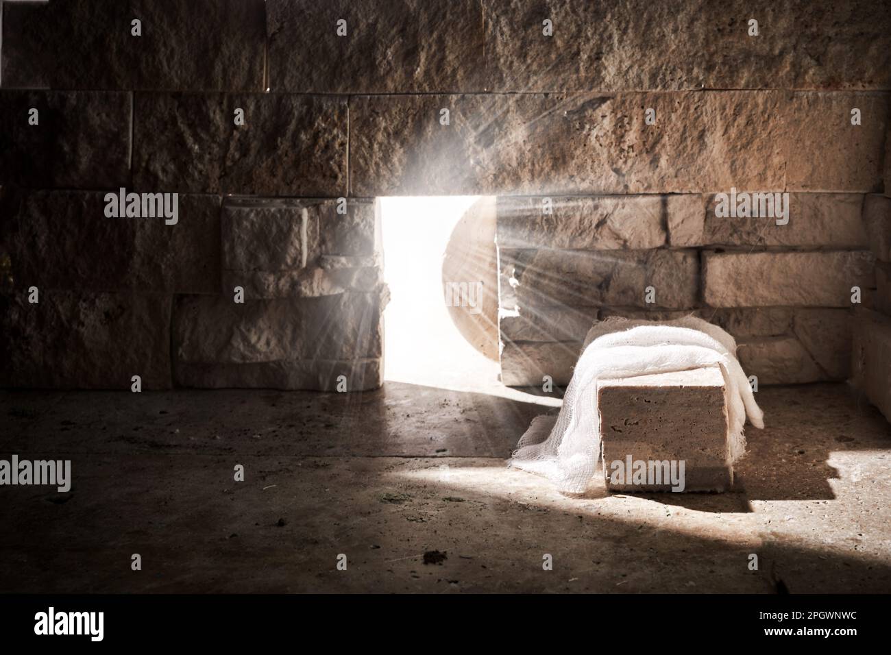 Empty tomb while light shines from the outside. Jesus Christ Resurrection. Christian Easter ...