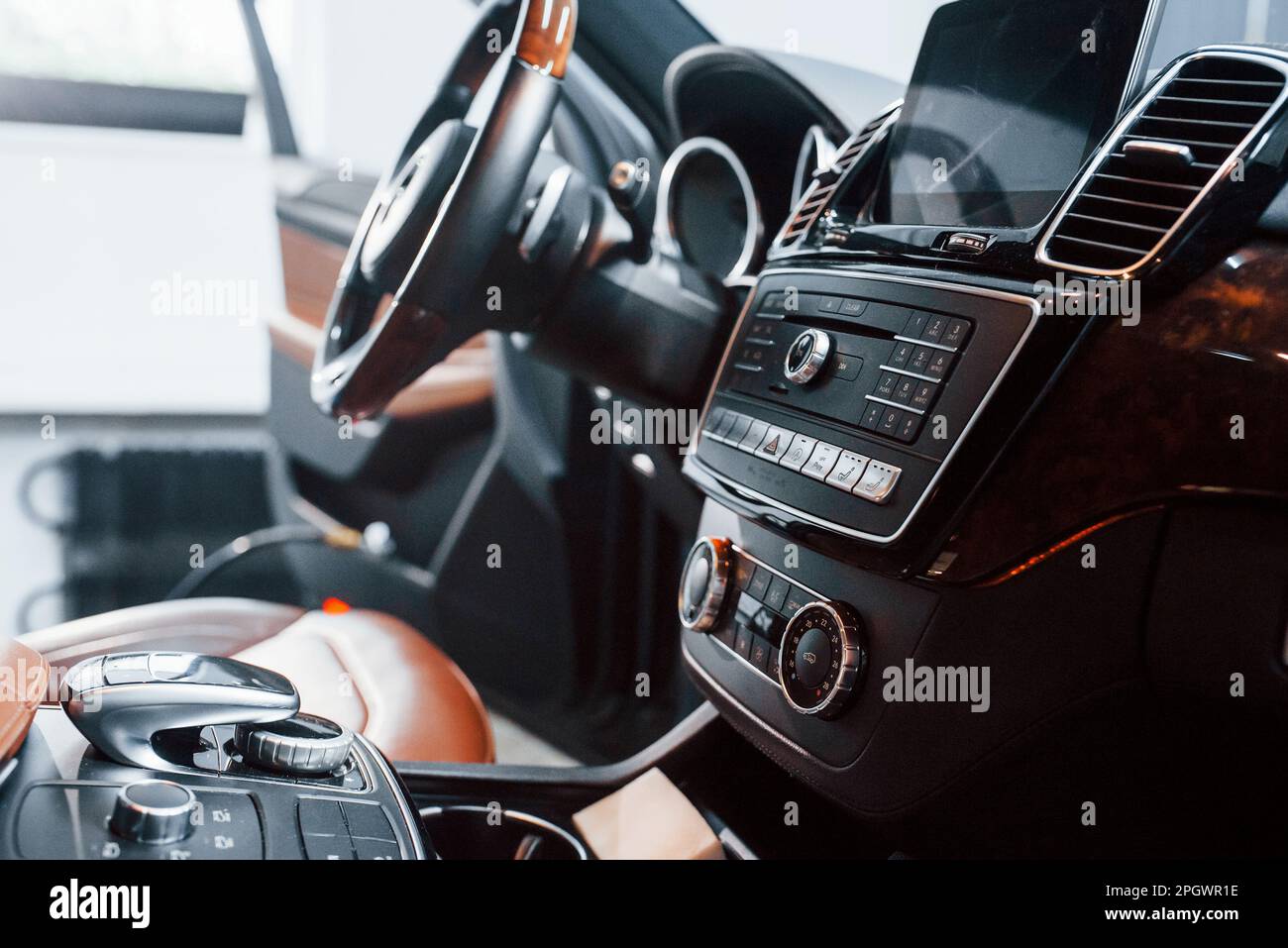 Inside of brand new modern black automobile. Front control panel Stock ...